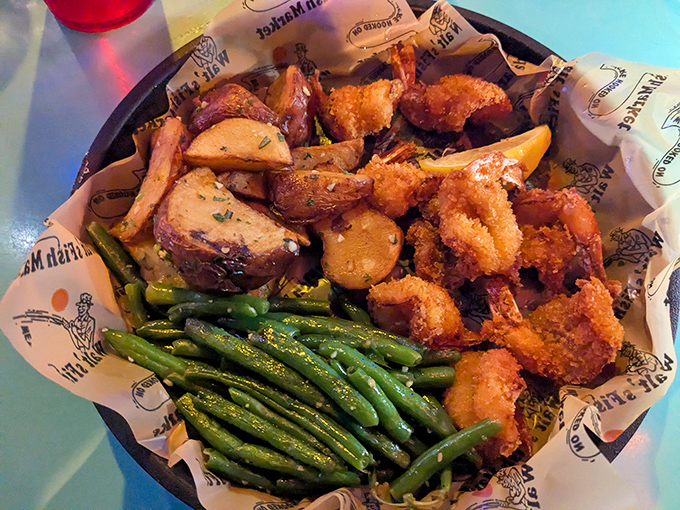 A basket of fried shrimp and potatoes that says, "Diet? What diet? You're in Florida&mdash;this is therapy."
