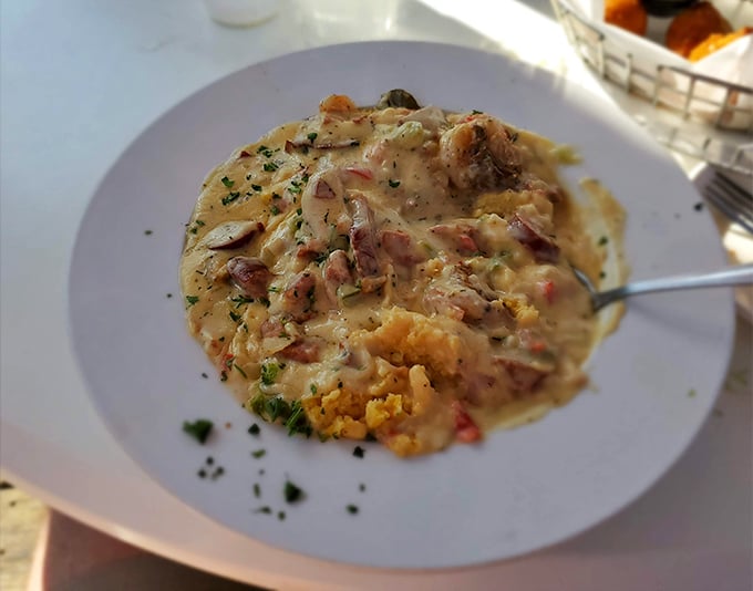Their shrimp and grits isn't just a dish, it's Southern poetry &ndash; creamy, savory, and rich enough to make your cardiologist wince approvingly.