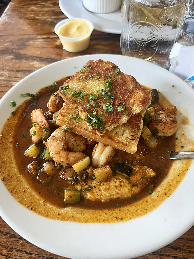 Shrimp and grits that would make a Lowcountry chef weep with joy&mdash;swimming in a sauce so good you'll contemplate drinking it directly from the bowl.
