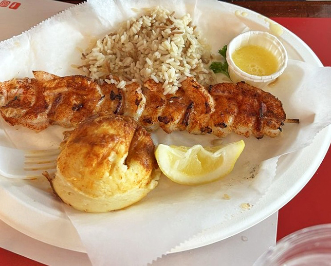 Simplicity at its most delicious &ndash; a perfectly grilled shrimp skewer that proves sometimes the best seasoning is just fire, smoke, and the ocean's natural bounty.