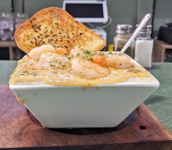 Shrimp and grits elevated to an art form. Those plump shrimp aren't just swimming in cheese&mdash;they're doing the backstroke in flavor country.