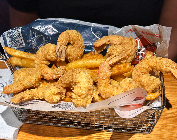 These fried shrimp aren't just golden&mdash;they're trophy-worthy. The kind of basket that makes you forget you're in a state famous for corn.