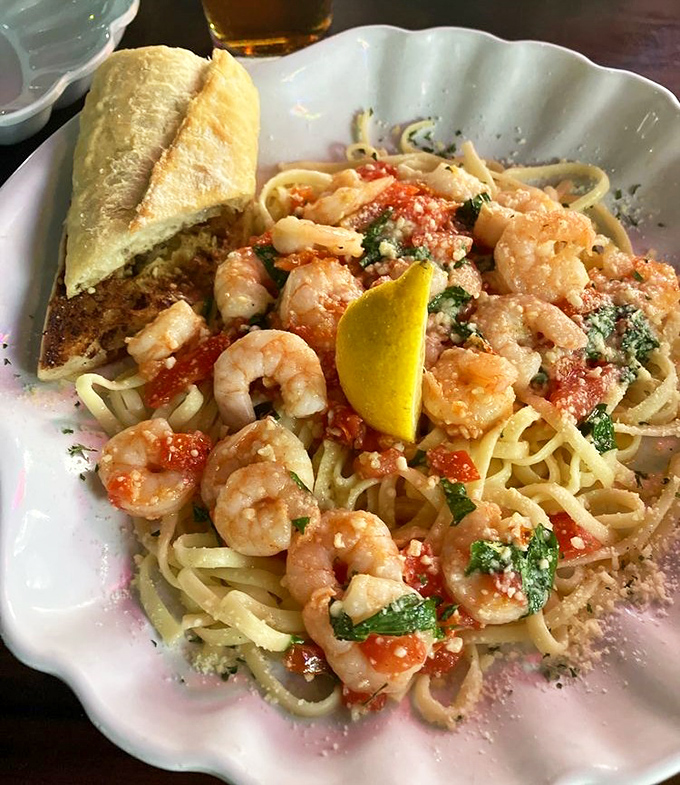 Shrimp scampi that makes pasta jealous. Plump shrimp, al dente linguine, and just enough garlic to keep vampires at bay for weeks.