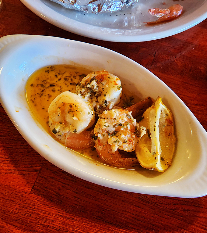 These plump shrimp bathing in buttery, herb-infused glory aren't just appetizers&mdash;they're little ambassadors of the sea, visiting your table with delicious intent.