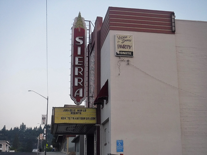 The iconic Sierra Theatre marquee has announced everything from Bogart classics to superhero franchises, a neon-lit timeline of American cinema.