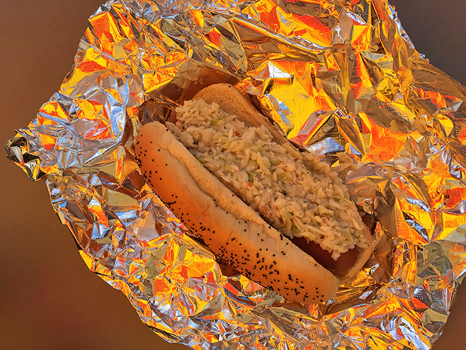 This slaw dog doesn't care about your diet plans. It's a beautiful mess of flavors that somehow works perfectly together.