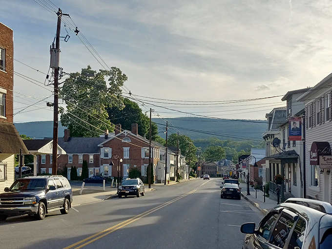 The golden hour in Bedford casts a warm glow on buildings that have watched generations come and go since Washington's day.