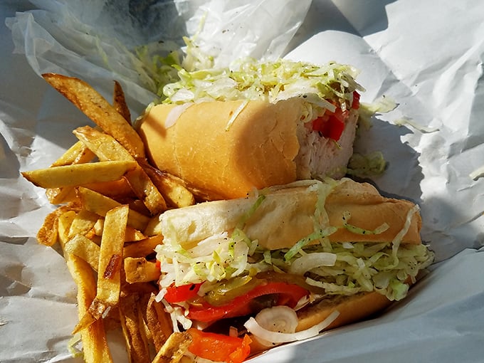 This isn't just a sandwich; it's a carefully constructed masterpiece of fresh ingredients. Note how the shredded lettuce adds the perfect crunch factor.