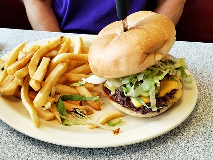 A proper diner burger doesn't need fancy toppings or a PR team&mdash;just quality beef, melty cheese, fresh veggies, and a bun that knows its supporting role. 