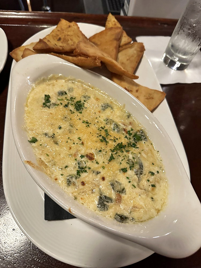 This creamy dip with crispy pita triangles isn't just an appetizer&mdash;it's the opening act of a meal that deserves a standing ovation.