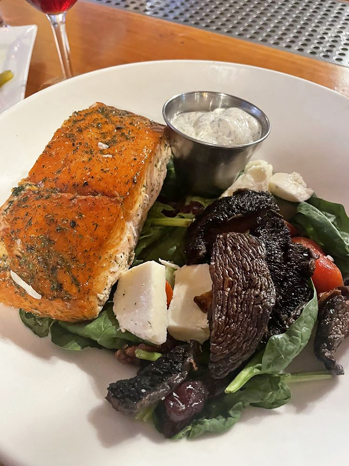Perfectly seared salmon with greens that would make your grandmother proud of your choices.