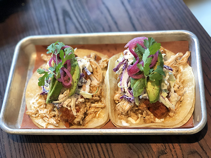 These aren't your average tacos &ndash; they're smoky masterpieces dressed in fresh cilantro, pickled onions, and pure California creativity.