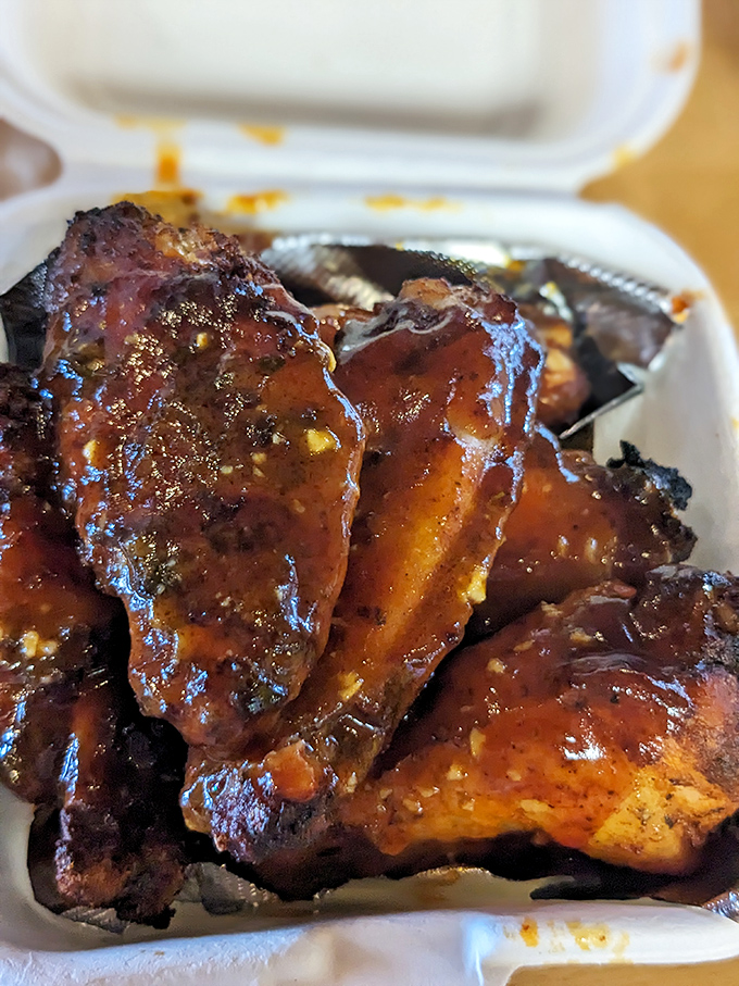 Wings so glossy they could star in their own cooking show – and probably should.