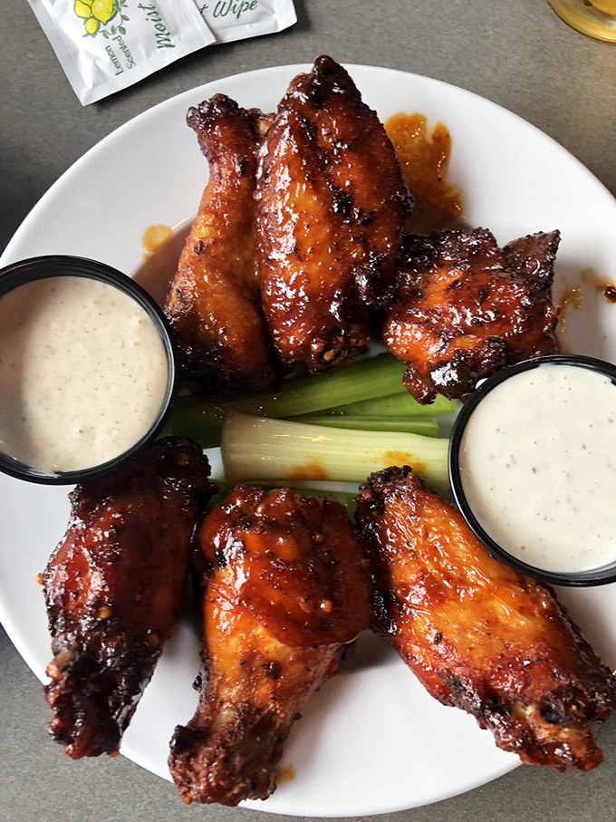 These wings aren't just smoked, they're transformed—achieving that perfect balance between sticky glaze and fall-off-the-bone tenderness.