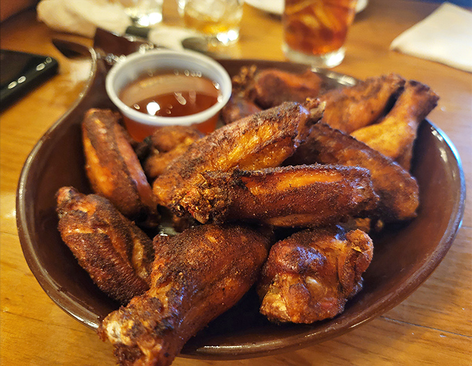Wings that have clearly graduated from flight school with honors. That crispy, spice-crusted exterior is hiding meat that practically high-fives your taste buds.