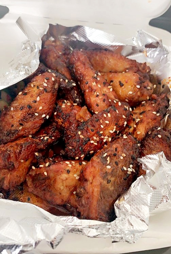These aren't just wings; they're flavor vehicles sprinkled with sesame seeds and enough spice to make your taste buds stand at attention.