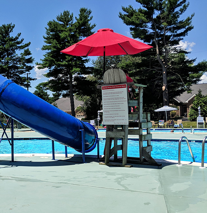 The community pool where summer memories are made and nobody judges your vintage swimsuit from 1987.