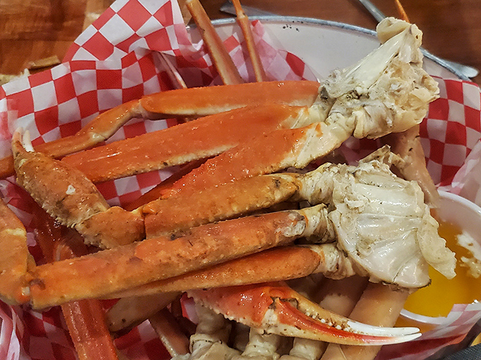 Snow crab legs so impressive they make you forget you're in Ohio. The red checkered paper says "casual," but the seafood whispers "special occasion."