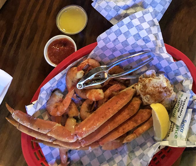 The universal language of seafood perfection: plump shrimp, sweet crab legs, and a squeeze of lemon. No translation necessary.