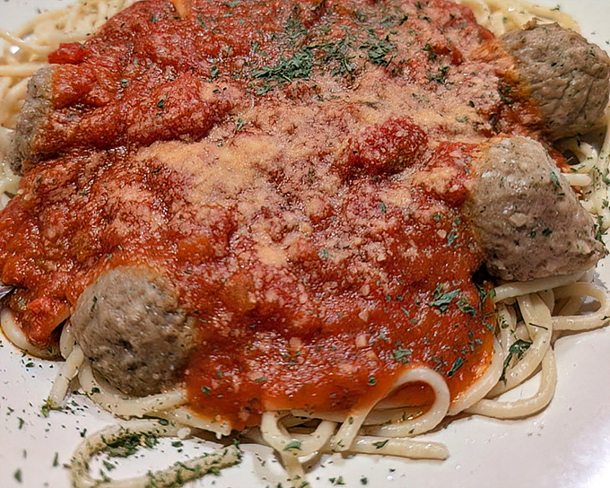 Spaghetti and meatballs—the dish your Italian grandmother would approve of. That rich tomato sauce practically sings opera while blanketing perfectly cooked pasta.