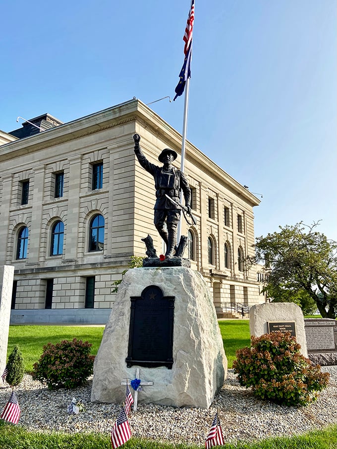Standing guard outside the courthouse, Peru's Doughboy statue reminds visitors that small towns often make the biggest sacrifices for their country.