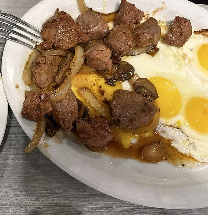 Breakfast gets a serious upgrade when steak tips join the morning party. Those sunny-side-up eggs are basically just showing off now.