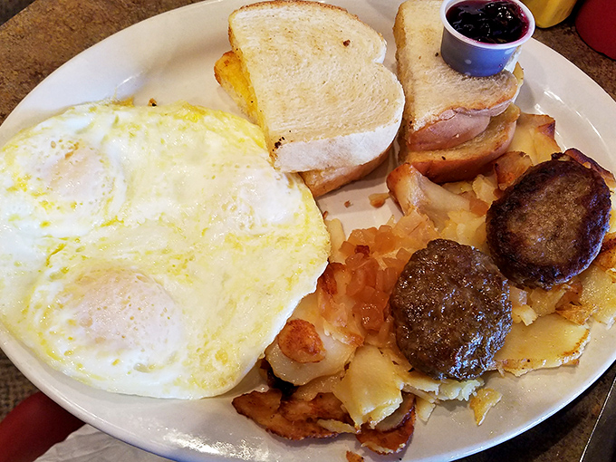 Eggs, sausage, potatoes, and toast&mdash;the breakfast quartet performing their greatest hits. This plate has more harmony than The Beatles at Abbey Road.