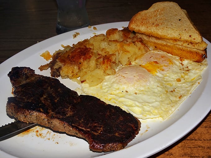Breakfast of champions: A perfectly seared steak alongside sunny eggs and crispy hash browns—the holy trinity of morning indulgence.