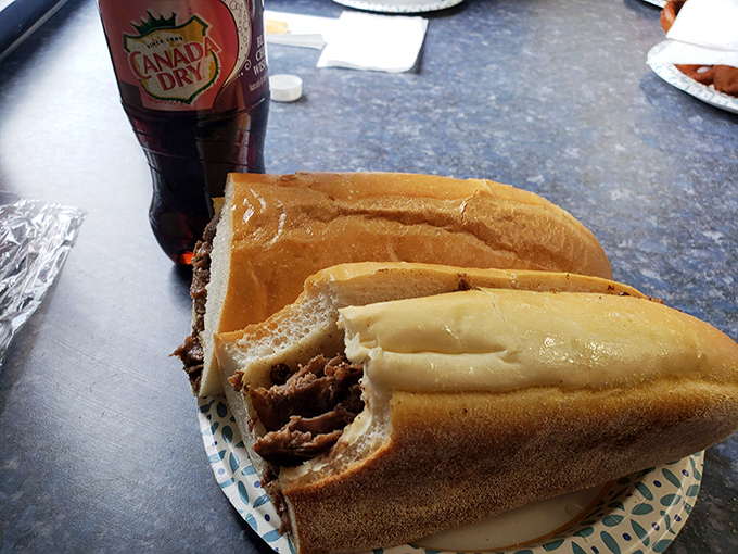 This steak sandwich means business, like a handshake deal sealed with melted cheese.