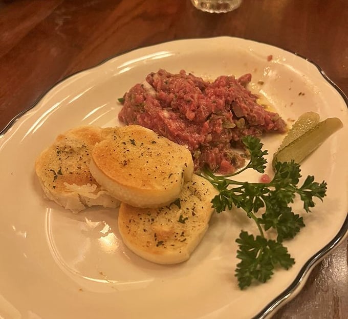 Steak tartare with toasted bread points&mdash;raw courage never looked so elegant or tasted so divine.