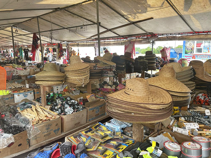 Straw hat heaven spreads beneath canvas skies, offering shade solutions that would make cowboys tip their brims.