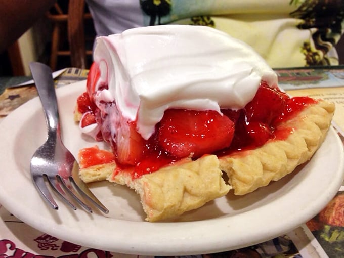 This strawberry pie doesn't just whisper "summer"—it belts out a Broadway musical number complete with ruby-red berries dancing in perfect harmony.
