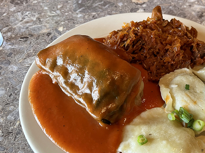 Golabki arrives like edible art, with tender cabbage wrapped around savory filling that grandmothers would proudly serve.