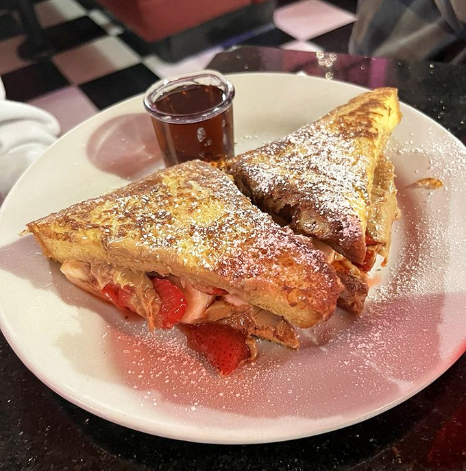 French toast stuffed with strawberries and cream cheese, dusted with powdered sugar&mdash;because sometimes breakfast should double as dessert and therapy.