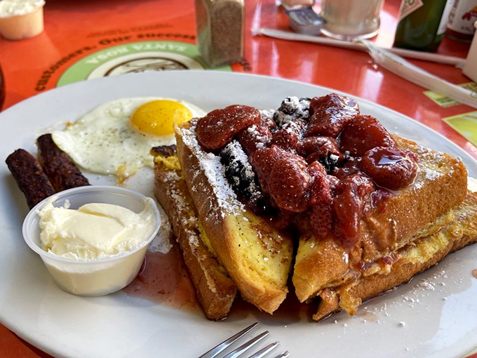 The stuffed French toast doesn't just arrive&mdash;it makes an entrance, crowned with berries and ready for its close-up.