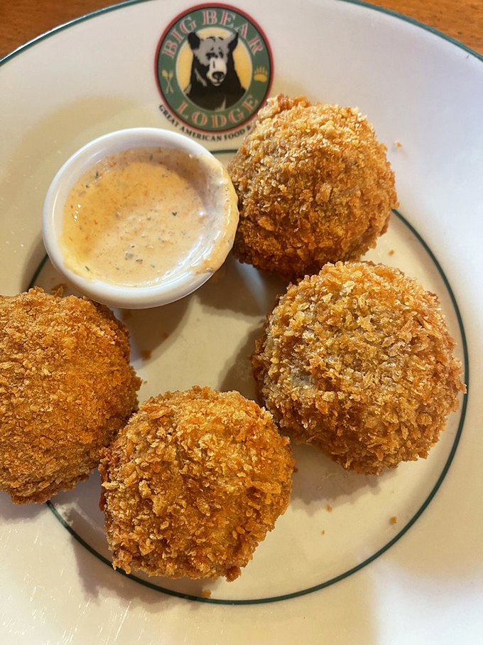 These stuffed mushrooms are having a better evening than most of us, swimming in their cheesy paradise.