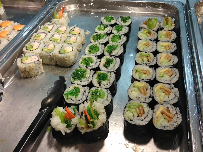 The sushi selection proves buffets can surprise you&mdash;fresh, colorful rolls lined up like soldiers ready for the delicious battle ahead.