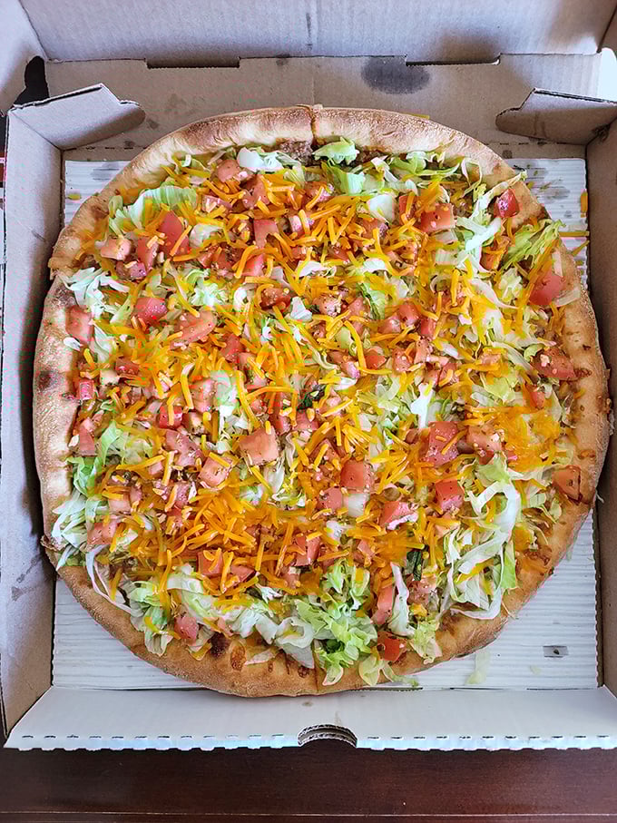 Taco Tuesday meets Pizza Friday in this colorful masterpiece. A fiesta of flavors that somehow works brilliantly despite defying tradition.