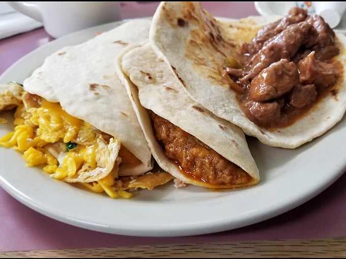 Breakfast tacos that make cereal seem like punishment—each tortilla embracing its fillings like they're precious cargo from the flavor gods.
