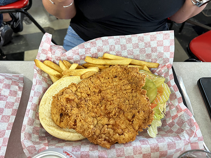 The tenderloin that ate Indianapolis &ndash; this breaded pork masterpiece follows the sacred Hoosier commandment: "Thou shalt extend well beyond thy bun."