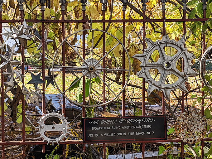 "The Wheels of Sindustry" asks profound questions through industrial art. These metal stars and gears speak volumes about modern life.