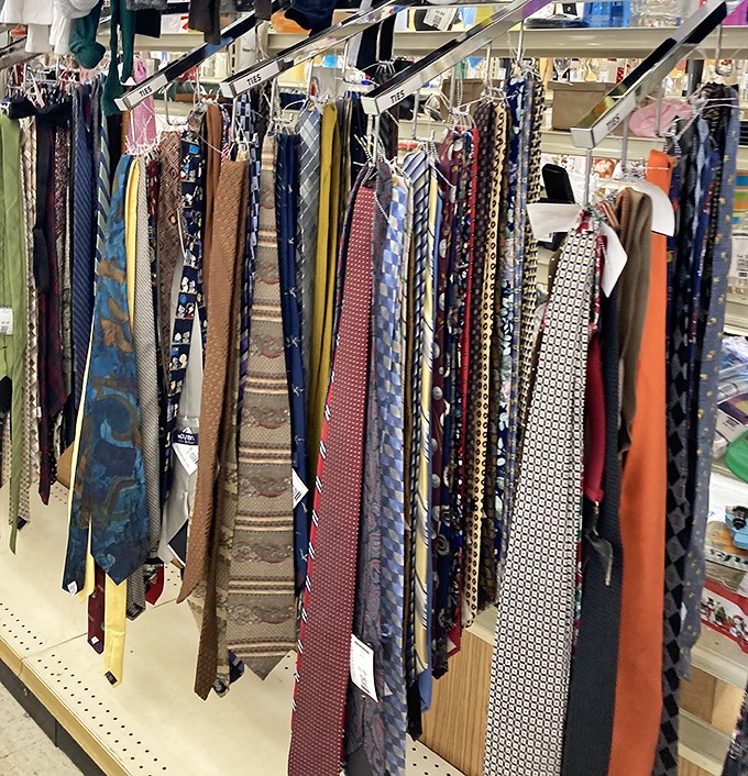 The tie section resembles a colorful keyboard of silk and polyester, each one telling the silent story of business meetings and wedding receptions past.