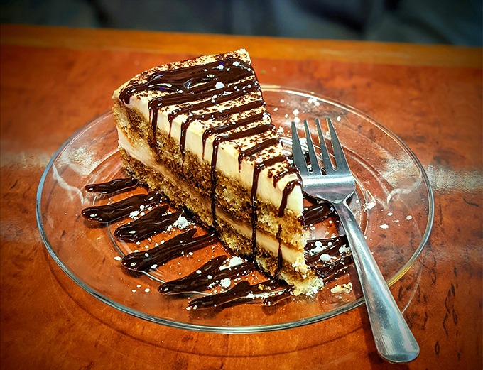 This tiramisu isn't just dessert&mdash;it's a masterclass in textural contrast, with chocolate drizzle creating edible art on the plate.