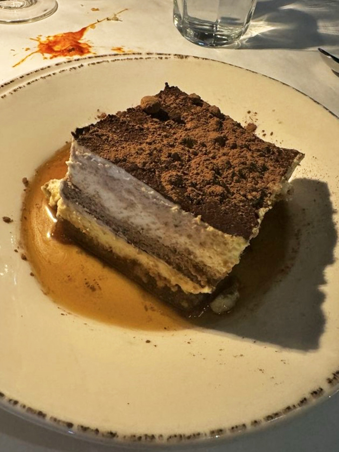 This tiramisu doesn't just satisfy a sweet tooth &ndash; it's an archaeological dig through layers of coffee-soaked bliss and mascarpone clouds that rewards every spoonful.