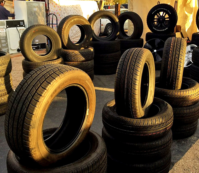 Rubber meets the road at the tire vendor. Where else can you contemplate tread patterns while eating a churro at 9 AM?
