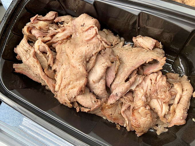 Tri-tip sliced against the grain reveals that perfect pink center. California's contribution to barbecue culture deserves this kind of respect.