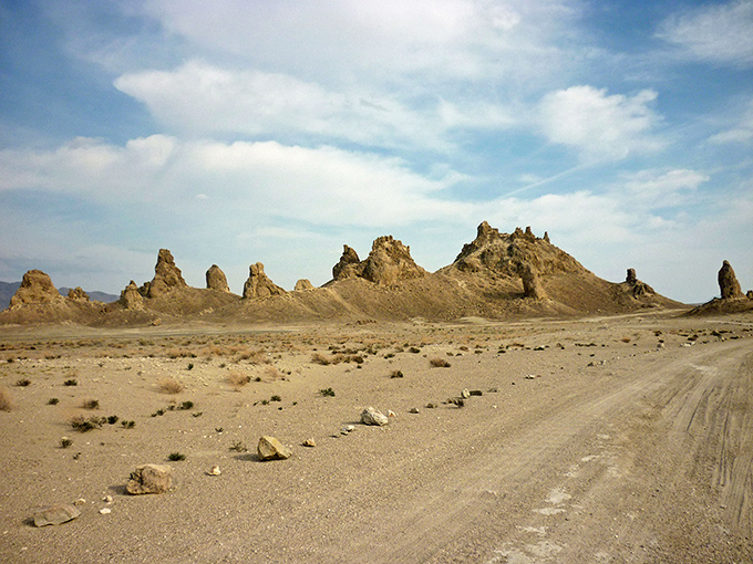 Nature's sculpture garden—the Trona Pinnacles rise from the ancient lakebed like petrified giants, sentinels of a landscape that feels more Martian than Californian.