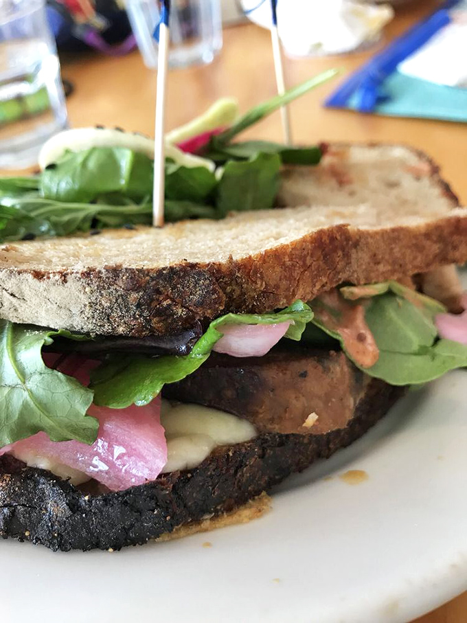 This sandwich isn't playing around&mdash;layers of goodness stacked between artisanal bread that deserves its own fan club.