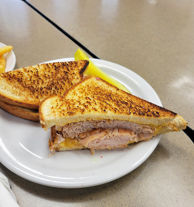 The turkey sandwich proves Slyman's isn't a one-hit wonder. Golden-toasted bread cradles tender meat in a handheld symphony that rivals its famous beef counterpart.