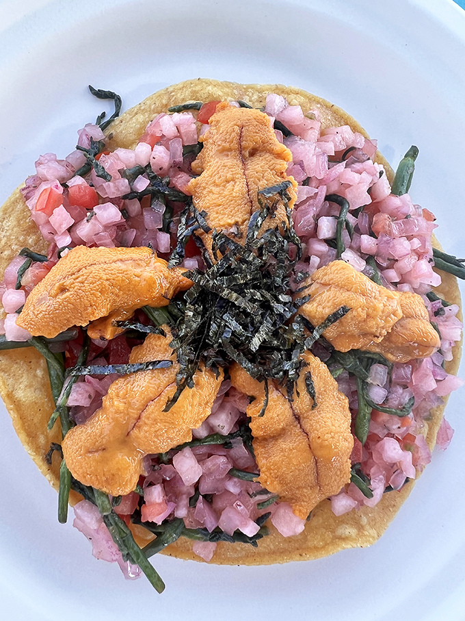 The Uni Tostada: where sea urchin royalty meets humble corn tortilla. A golden crown of oceanic butter atop a vibrant bed of freshness.